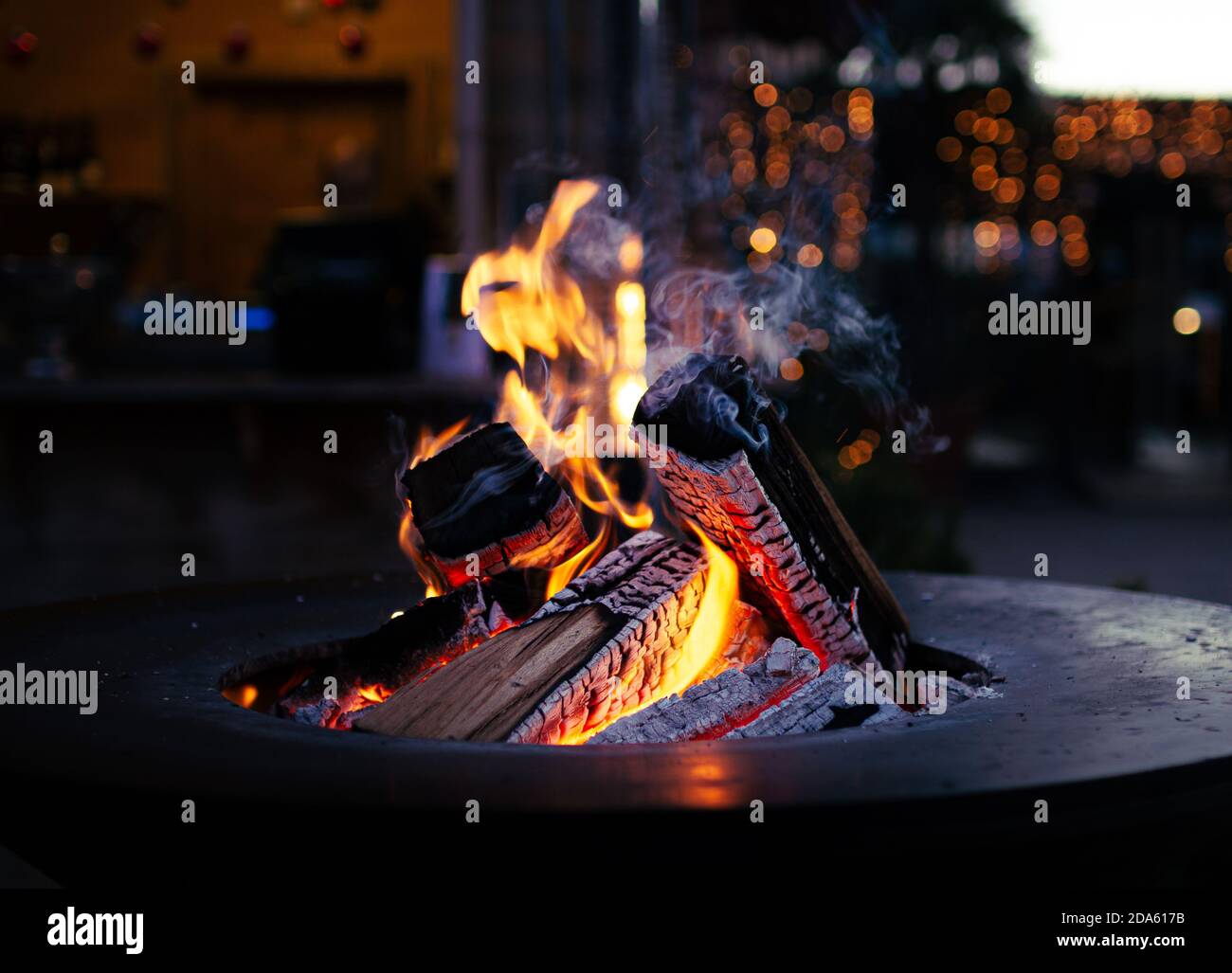 fireplace at traditional christmas market (Christkindlmarkt) at Meran ...