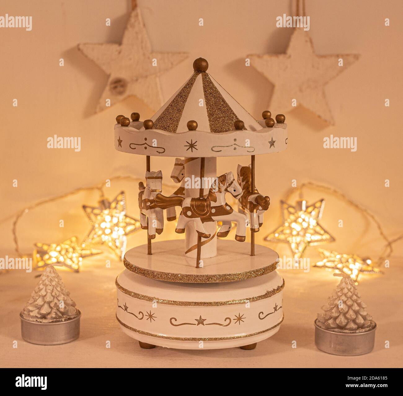 christmas festive scenery showing a musical box with golden carousel ...