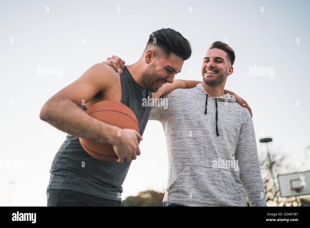 Two boys playing basketball hi-res stock photography and images - Alamy