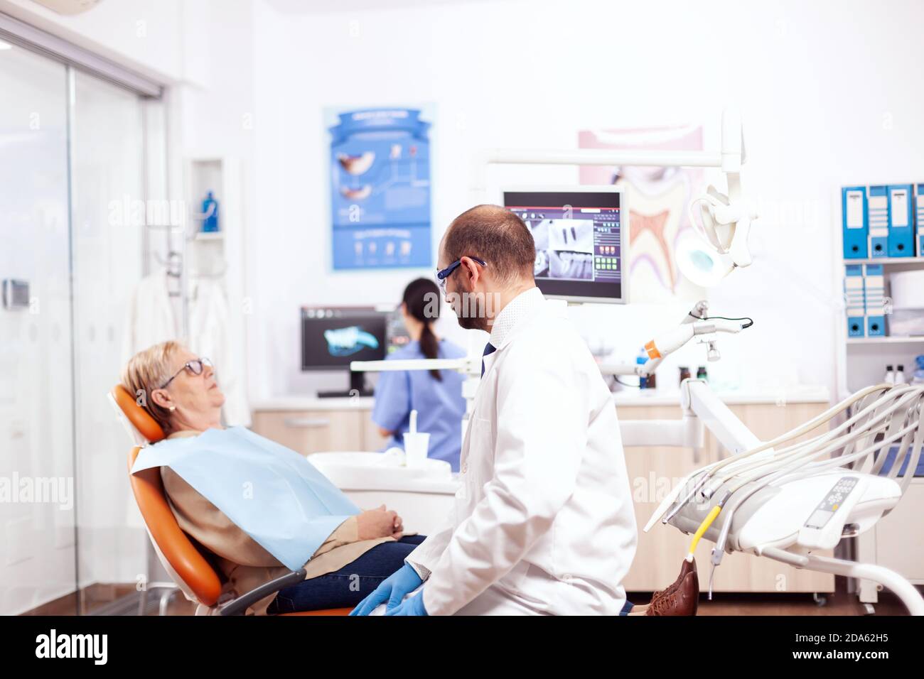 Woman wearing lab coat hi-res stock photography and images - Alamy