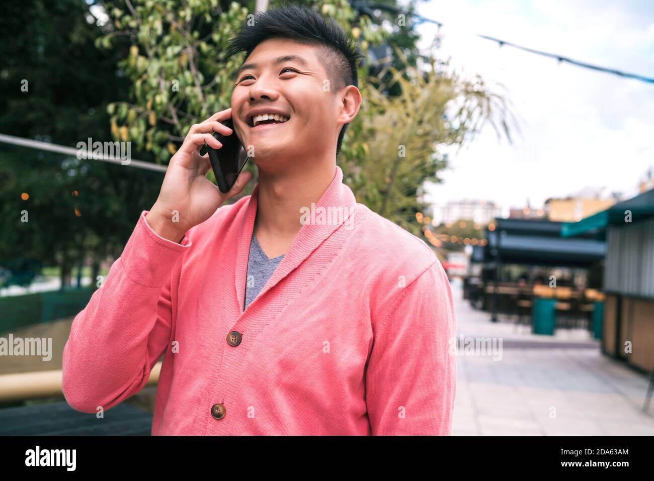 Asian man talking hi-res stock photography and images - Alamy