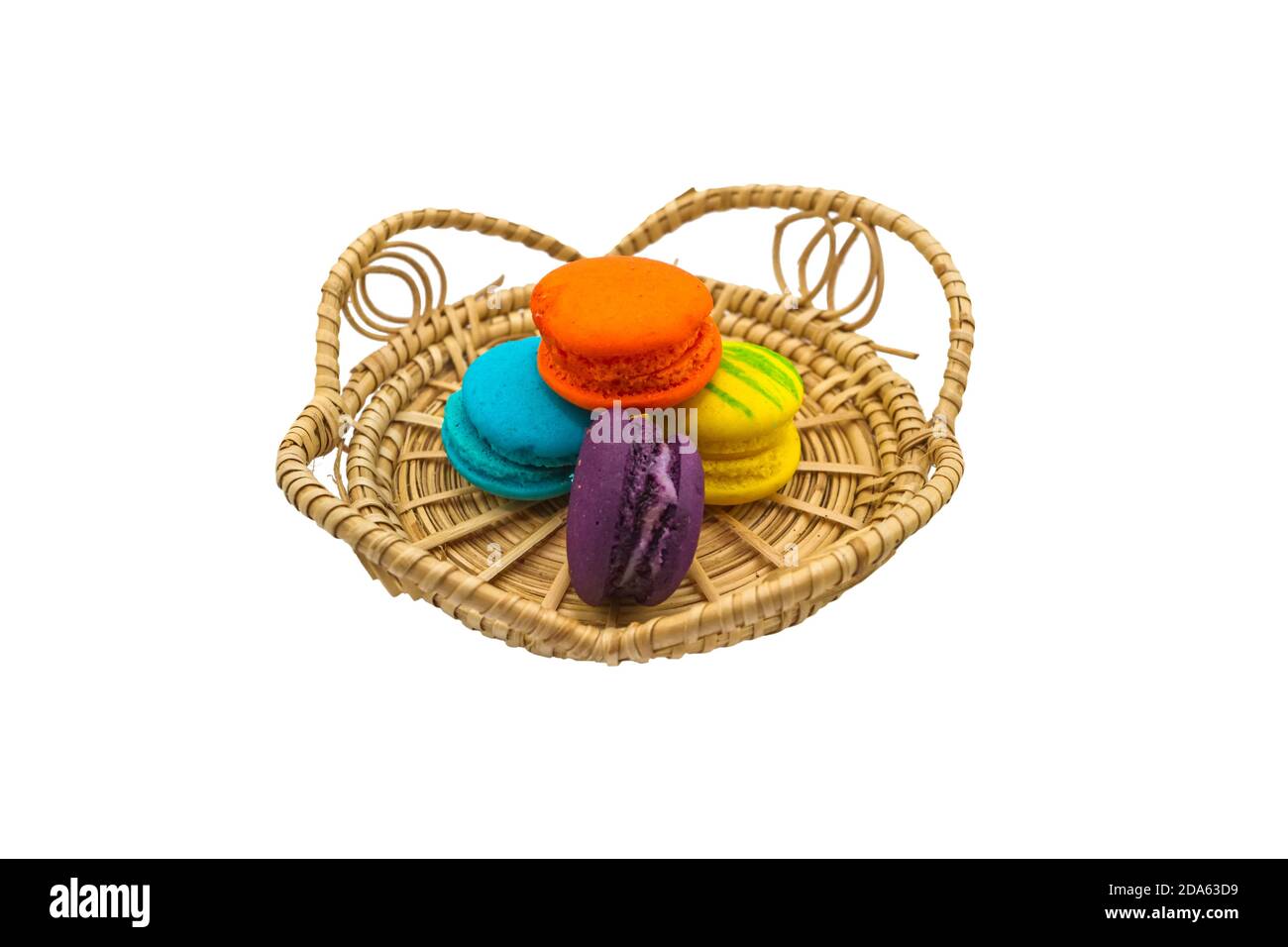 Sweet and colourful french macaroons or macaron stack in bucket wooden ...