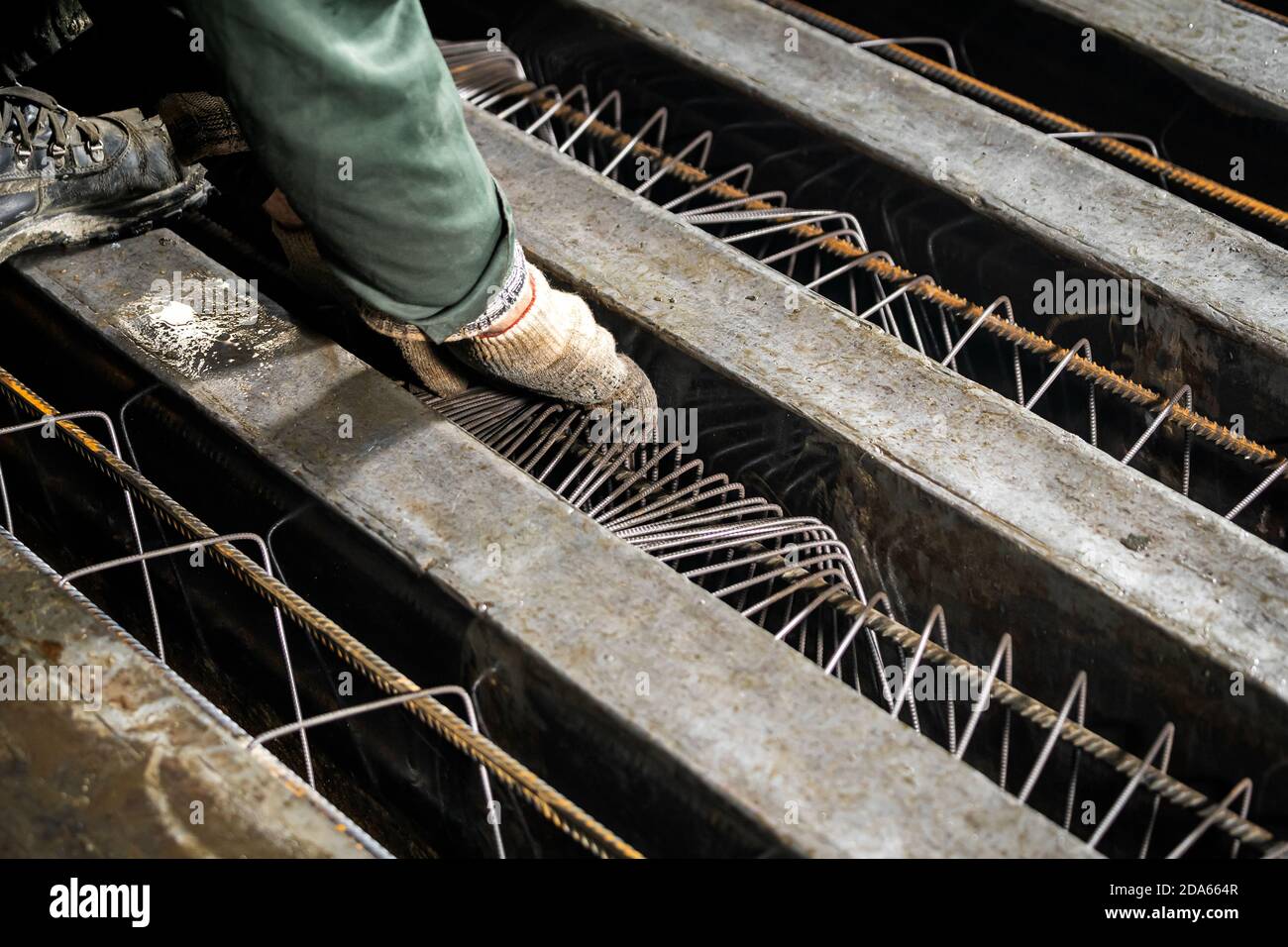 Construction workers install bend rebar hi-res stock photography and ...