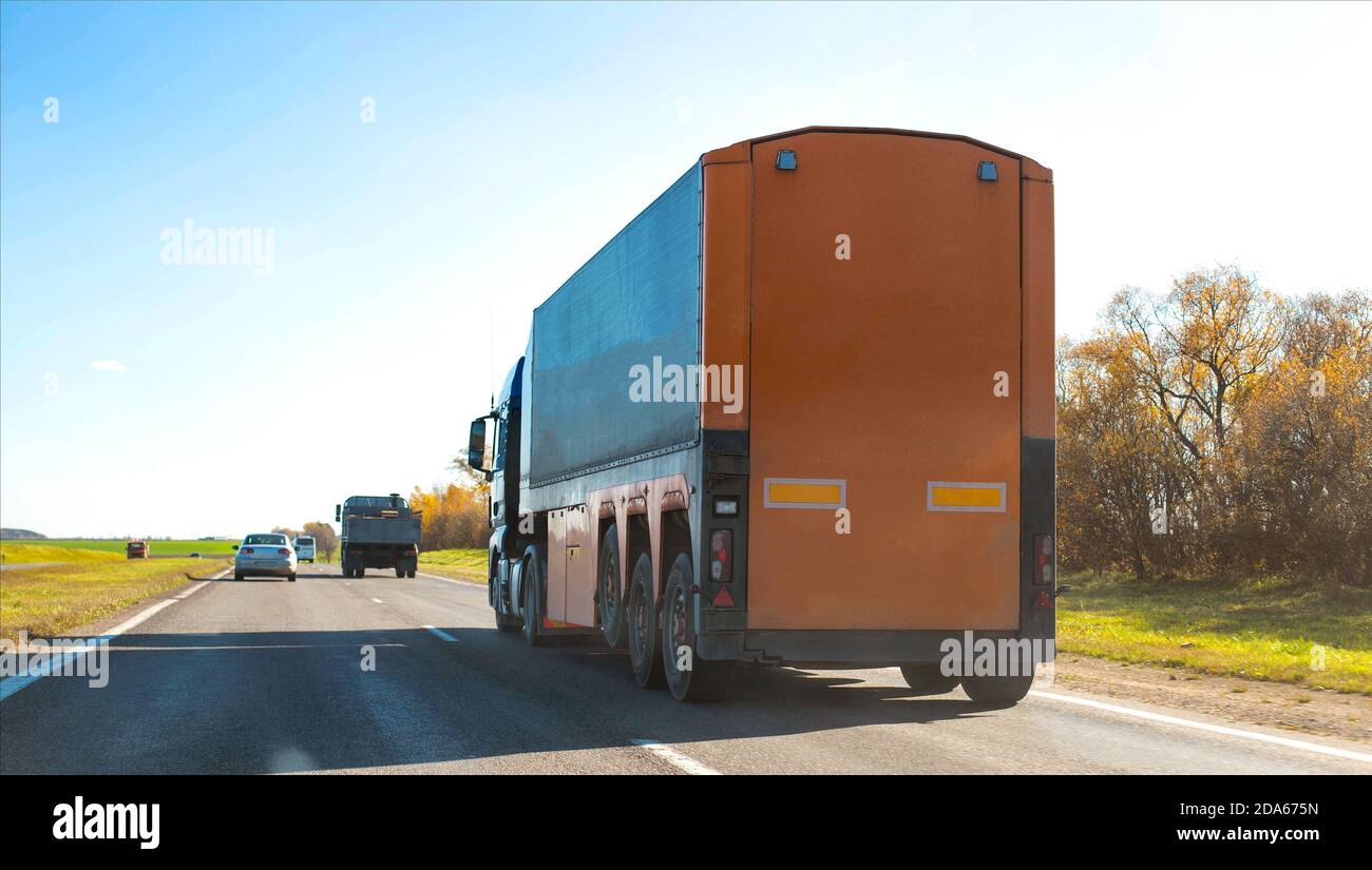 an unusual trailer for a trucker truck with a broken frame and a sloth ...