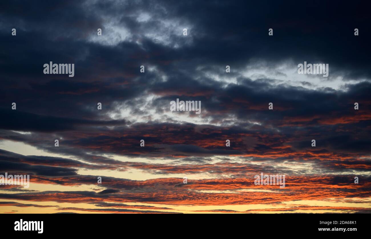 Beautiful and warm colored sunset sky Stock Photo - Alamy