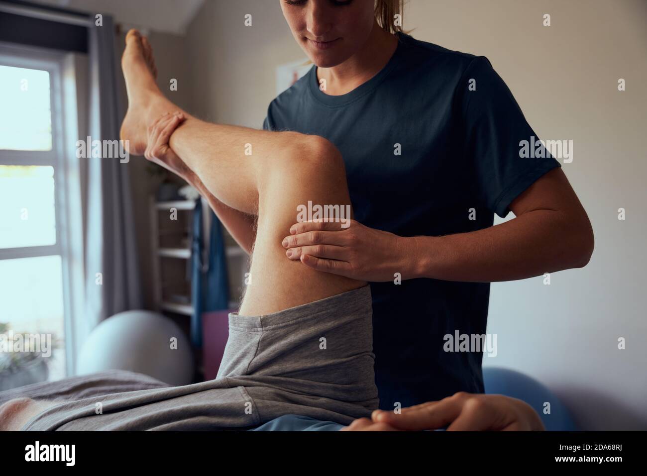 Hand On Leg High Resolution Stock Photography and Images - Alamy
