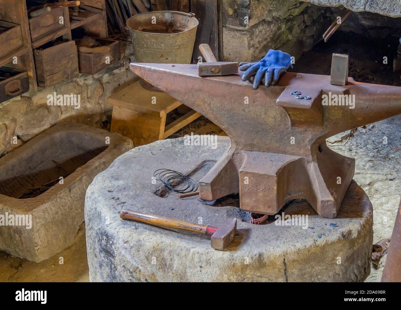 forge scenery with hammer and anvil Stock Photo - Alamy