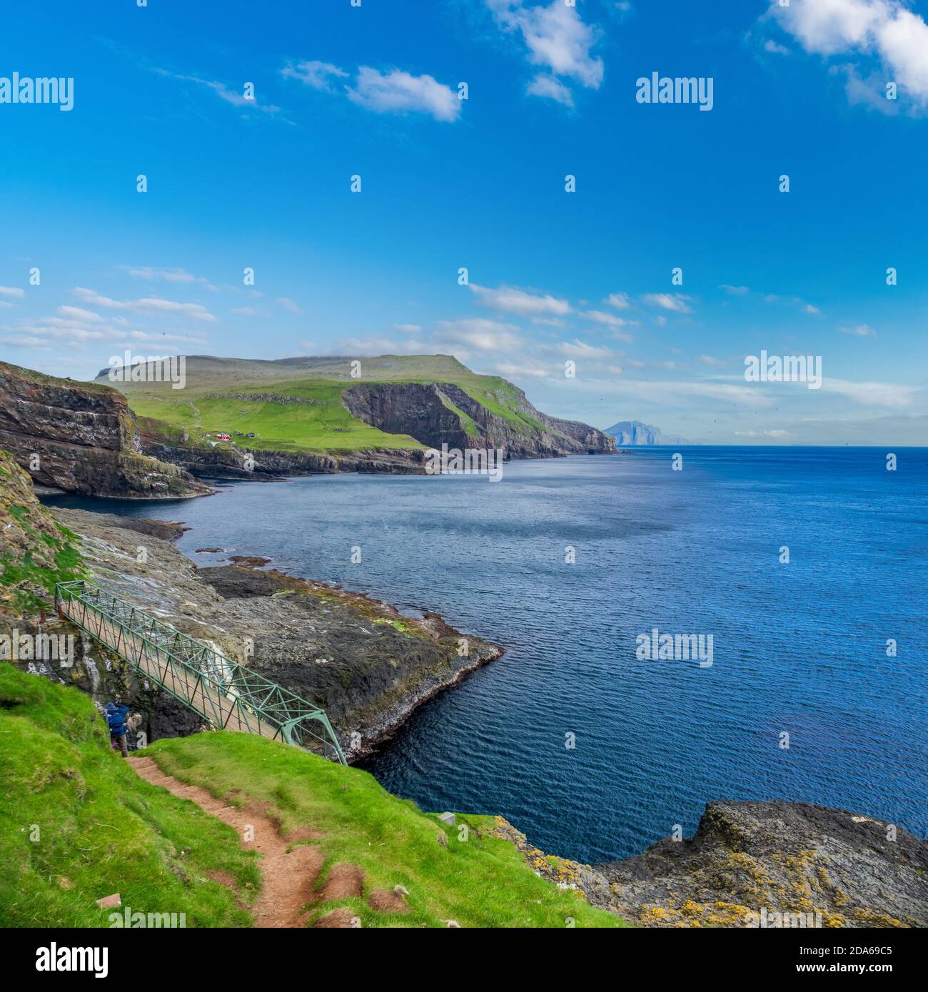 Spectacular Mykines island with iron bridge in Faroe Islands Stock ...