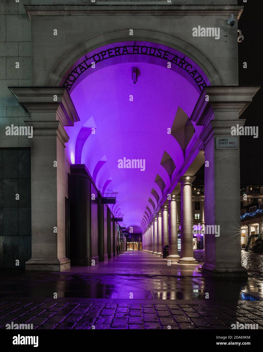 The Royal Opera House arcade in Covent Garden is lit up in a beautiful ...
