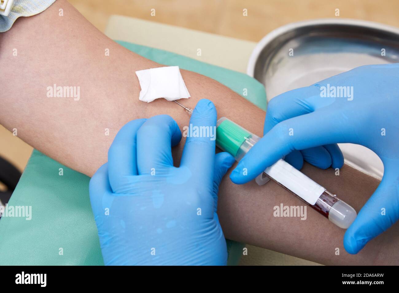 Woman giving blood sample doctor hi-res stock photography and images ...