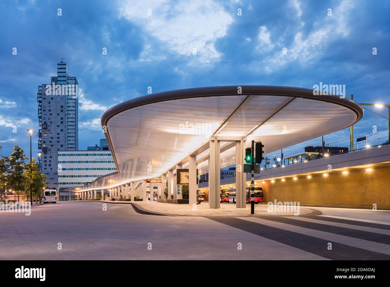 Illuminated new busstion at night. The new Tilburg bus station has a ...