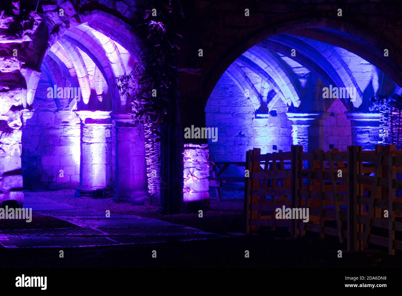 Blue & violet spotlit arches in Castle Museum Gardens, York, North ...