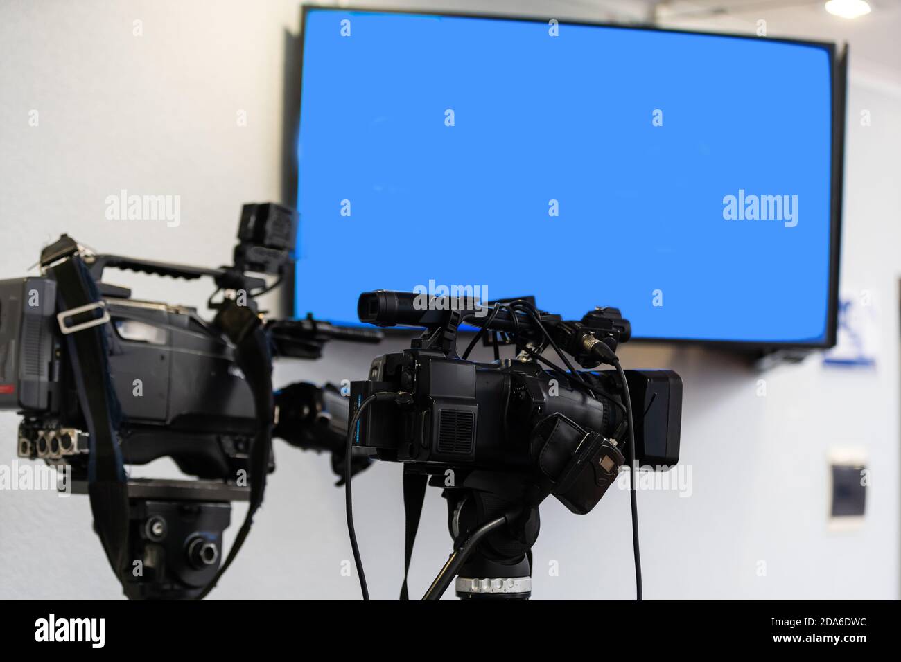 blank screen hanging on the wall Stock Photo - Alamy