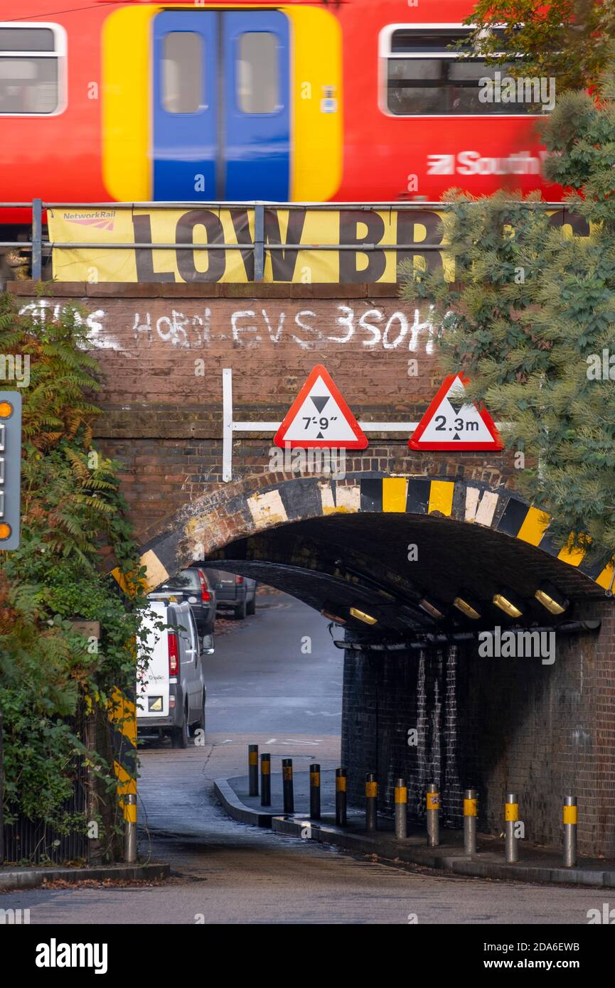 Low railway bridge warning signs hi-res stock photography and images ...