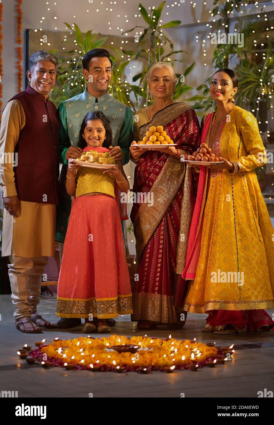 Holding sweets hi-res stock photography and images - Alamy