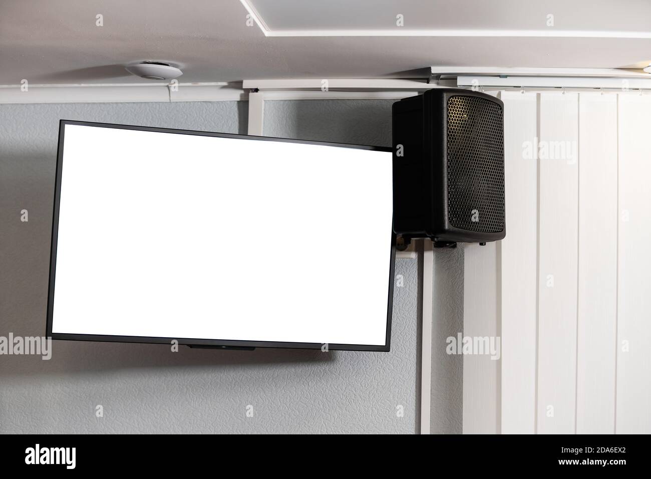 blank screen hanging on the wall Stock Photo - Alamy