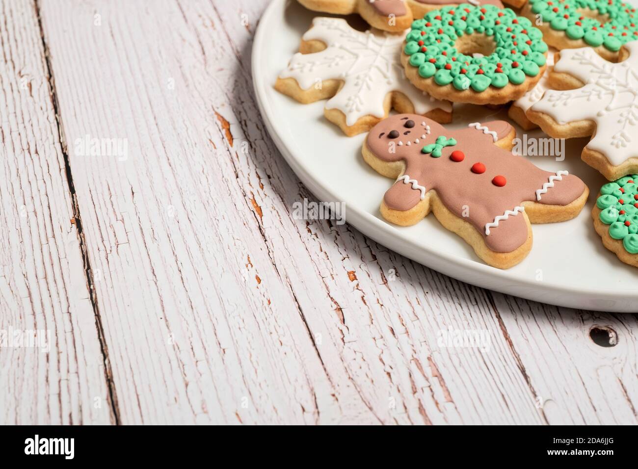 Plate of decorated Christmas gingerbread cookies gingerbread man with ...
