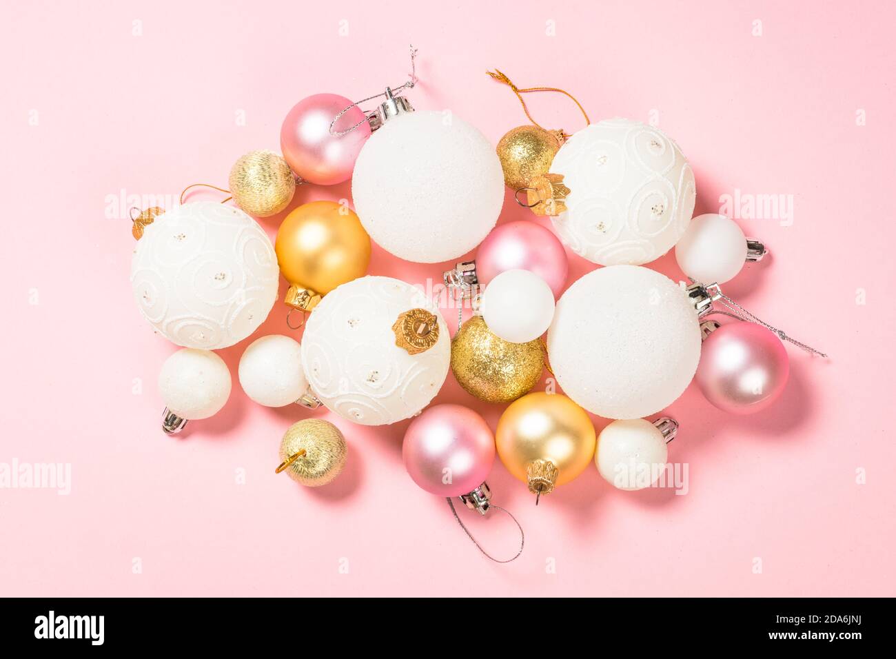 Christmas pink flat lay background with holiday decorations Stock Photo ...