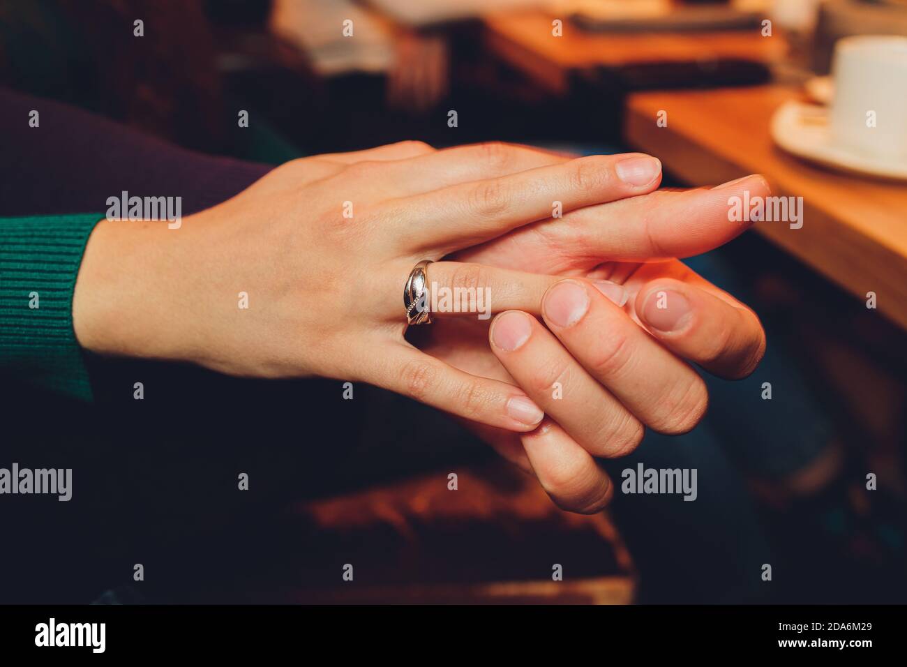 women's and men's watches. man's hand holding a female Stock Photo - Alamy