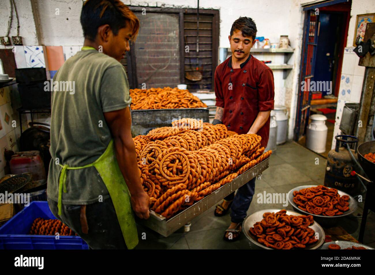 Kathmandu, Nepal. 10th Nov, 2020. Confectioners carry traditional ...