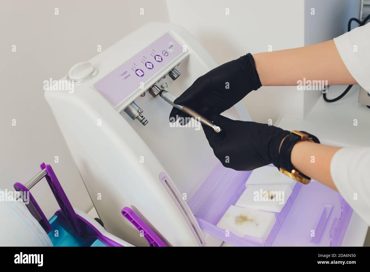 Disinfection of a dental instrument. Ultrasound sterilization of a ...