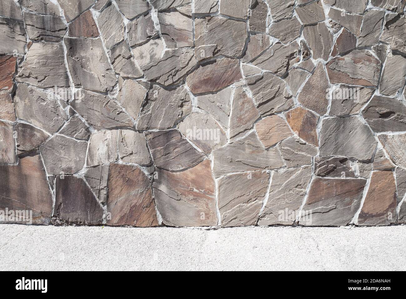 Outdoor mosaic stone wall pattern, frontal background photo texture ...