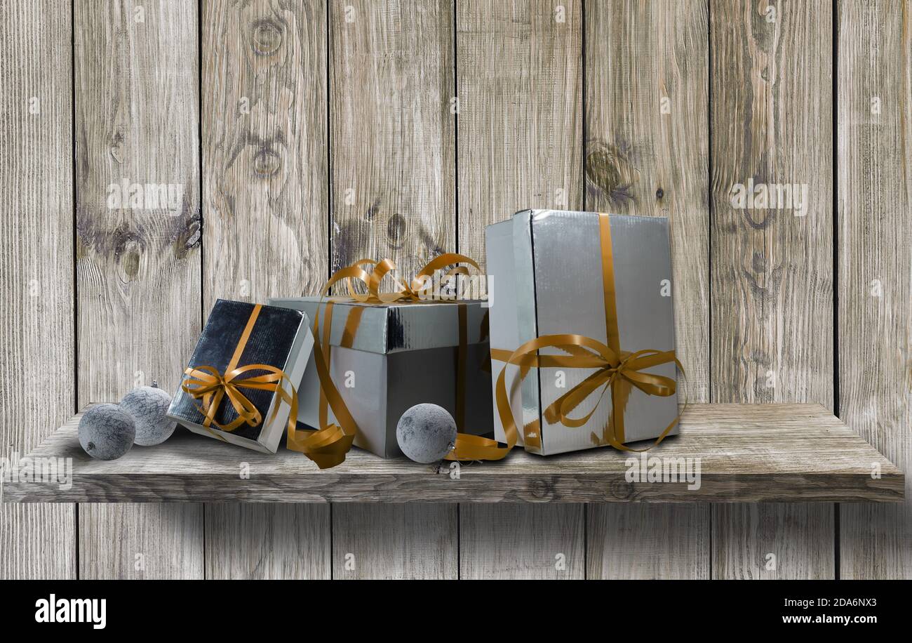 Wooden texture background. Christmas gift boxes table Stock Photo - Alamy