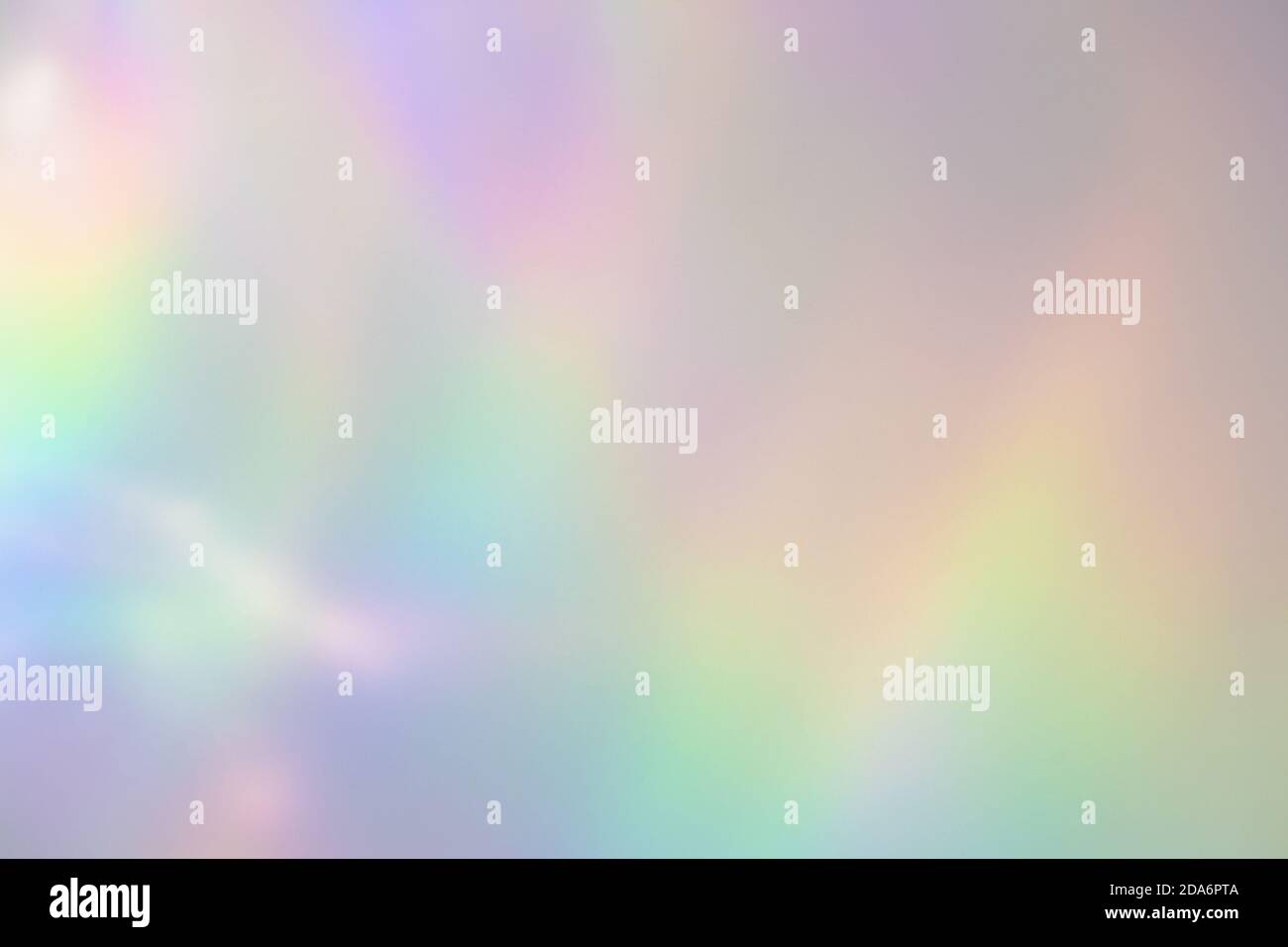 Blurred rainbow light refraction texture on white wall Stock Photo - Alamy
