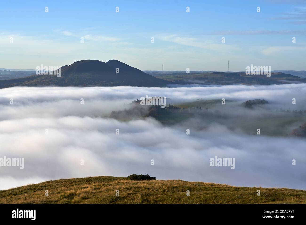 View of the Eildon Hill shrouded in autumn mist from the Black Hill in ...