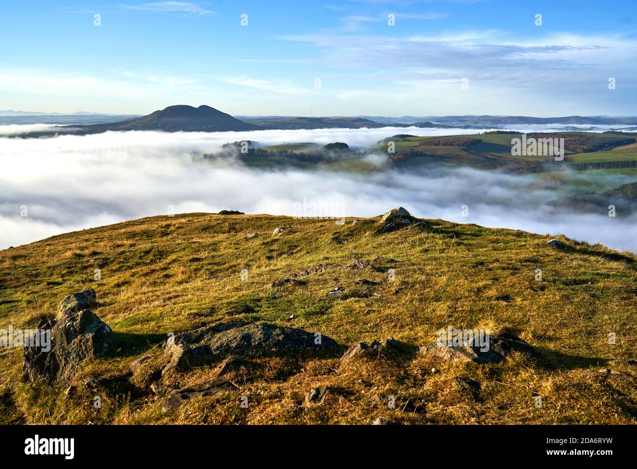 View of the Eildon Hill shrouded in autumn mist from the Black Hill in ...