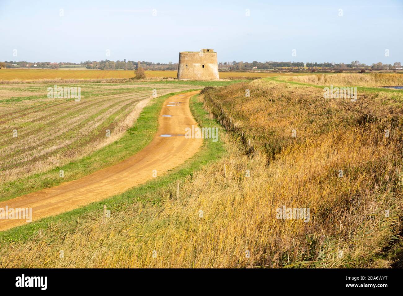 Martello tower Z from footpath on sea wall flood defence embankment ...