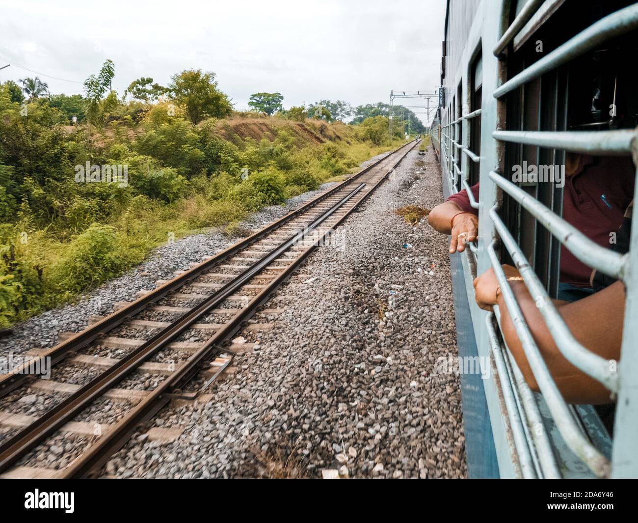 View of passengers hands on the windows of the train Stock Photo - Alamy
