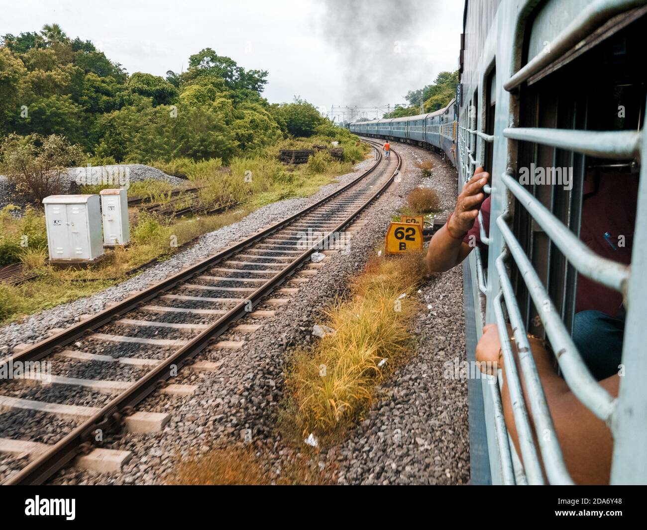 View of passengers hands on the windows of the train Stock Photo - Alamy