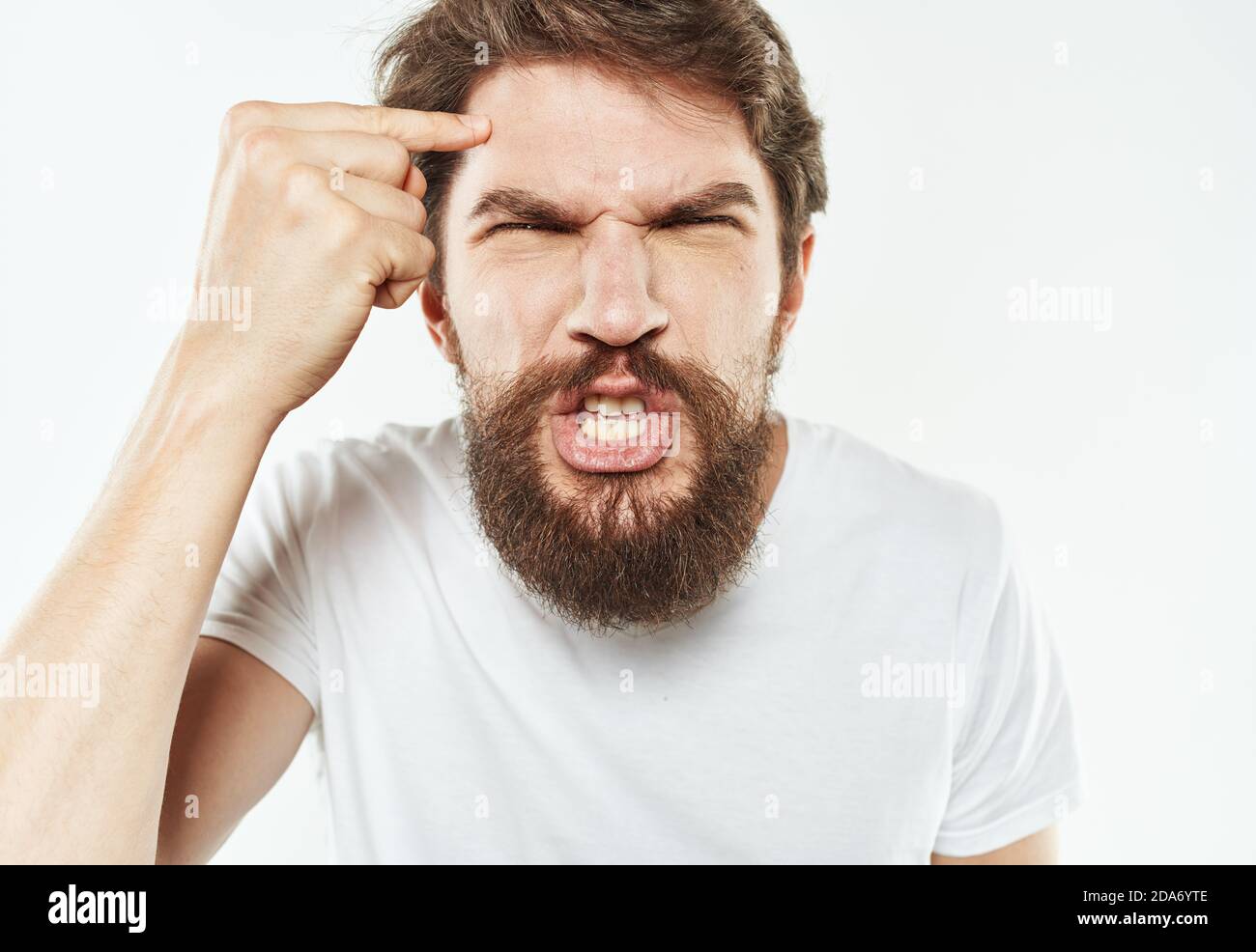 Aggressive man irritability emotions gesturing with model hands Stock ...