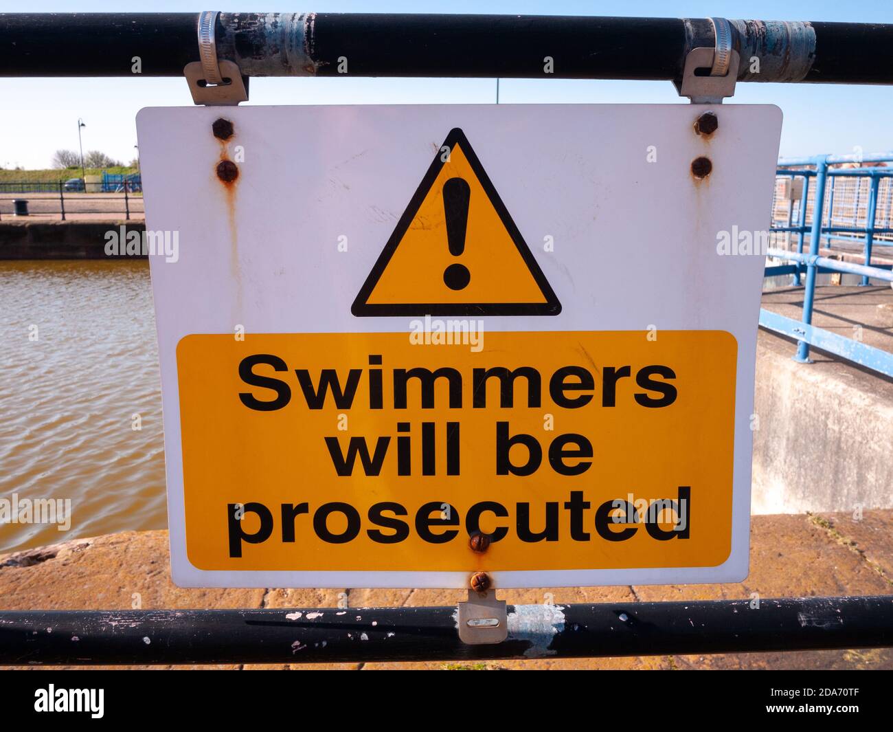 No swimming sign at the dockyard in Barrow, Cumbria, England Stock ...