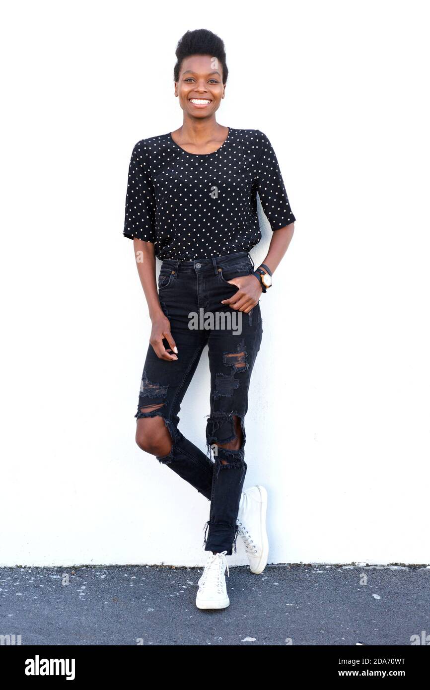 Full length portrait of attractive young african female model standing ...