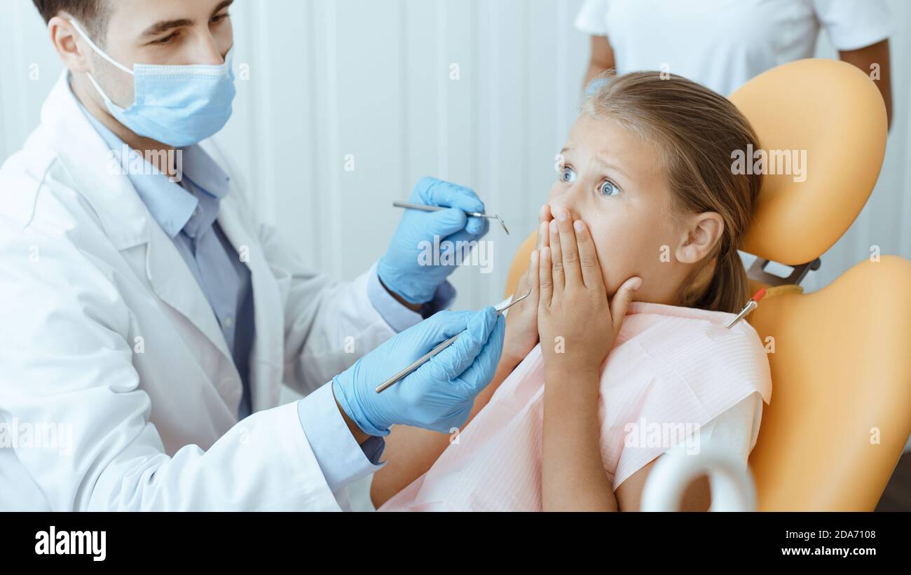 Overcome fear of dental treatment and visit to dentist Stock Photo - Alamy
