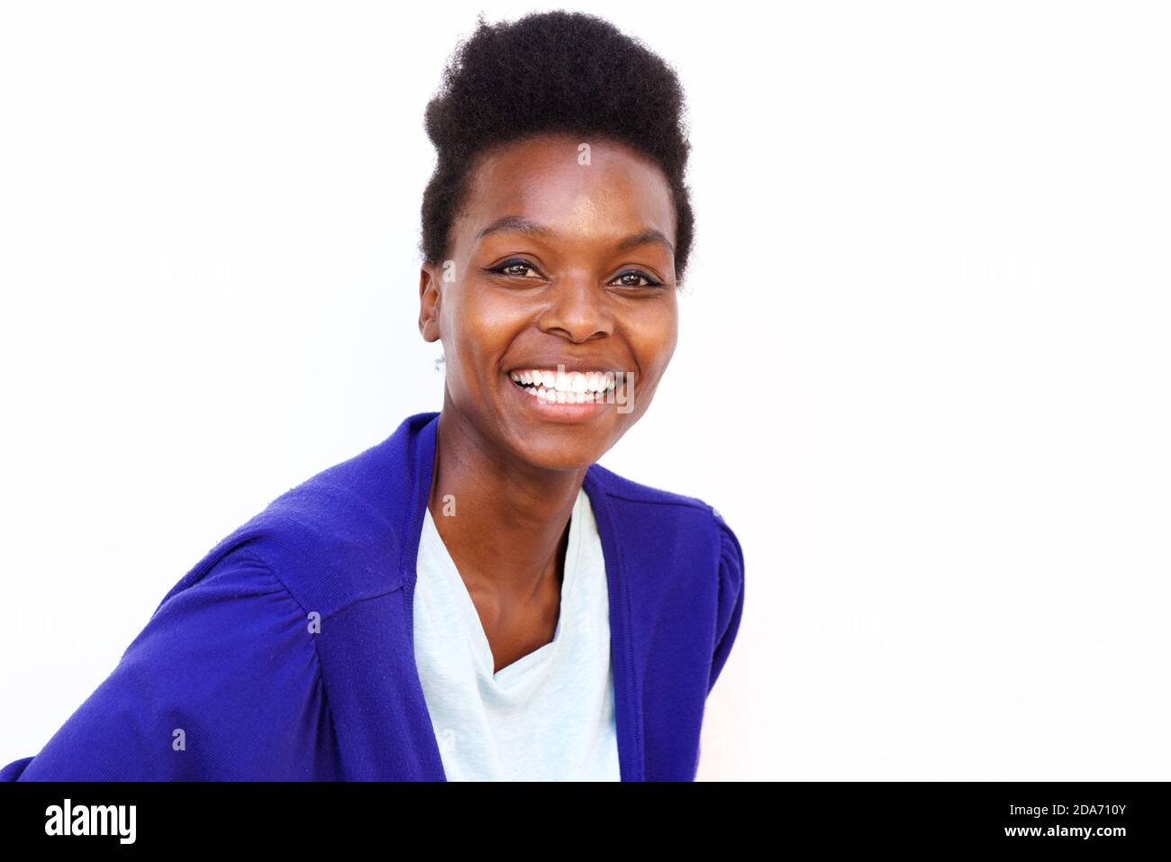 Close up portrait of happy young african female smiling against white ...
