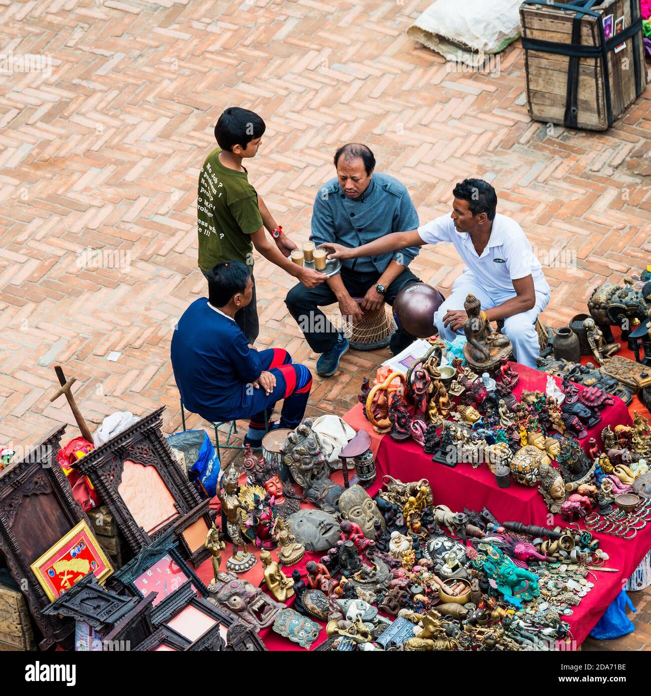 Boy serving tea in Kathmandu, Nepal Stock Photo - Alamy