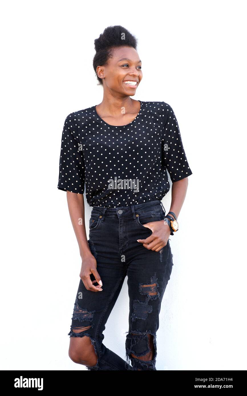 Portrait of stylish young african female model posing against white ...