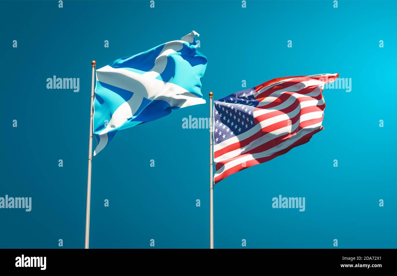 Beautiful national state flags of Scotland and USA together at the sky ...
