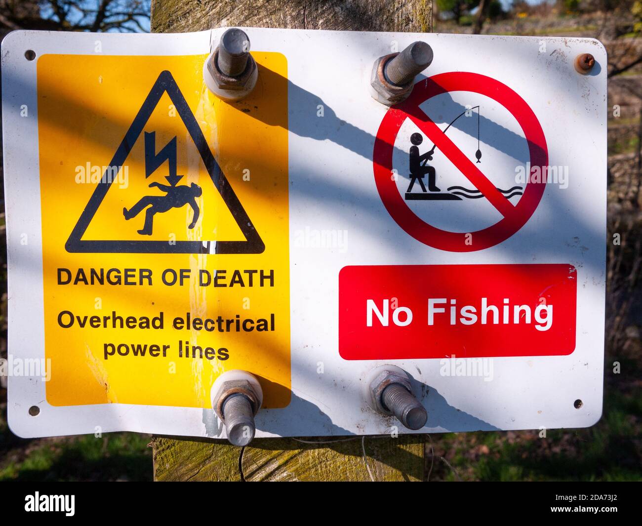 A warning sign on a river bank Stock Photo - Alamy