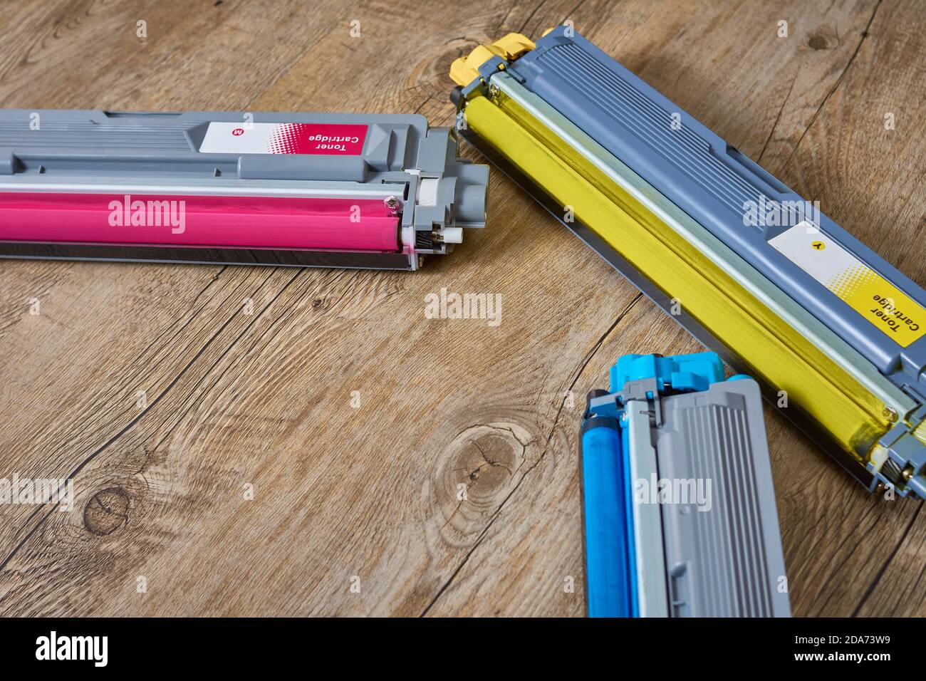 Set of three toner cartridges for color laser printers in yellow, cyan ...