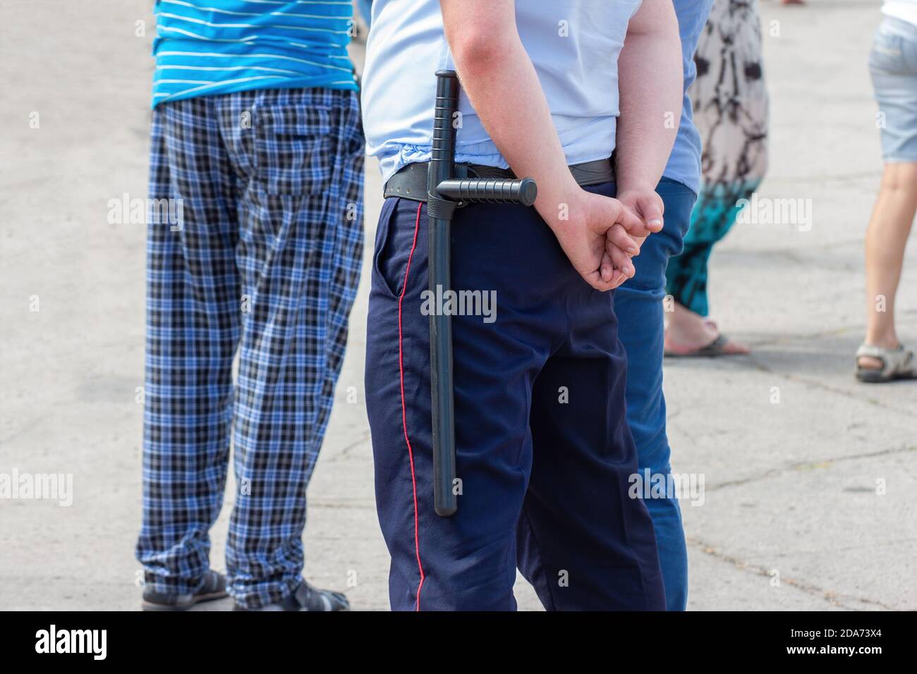 Hand police baton on belt hi-res stock photography and images - Alamy