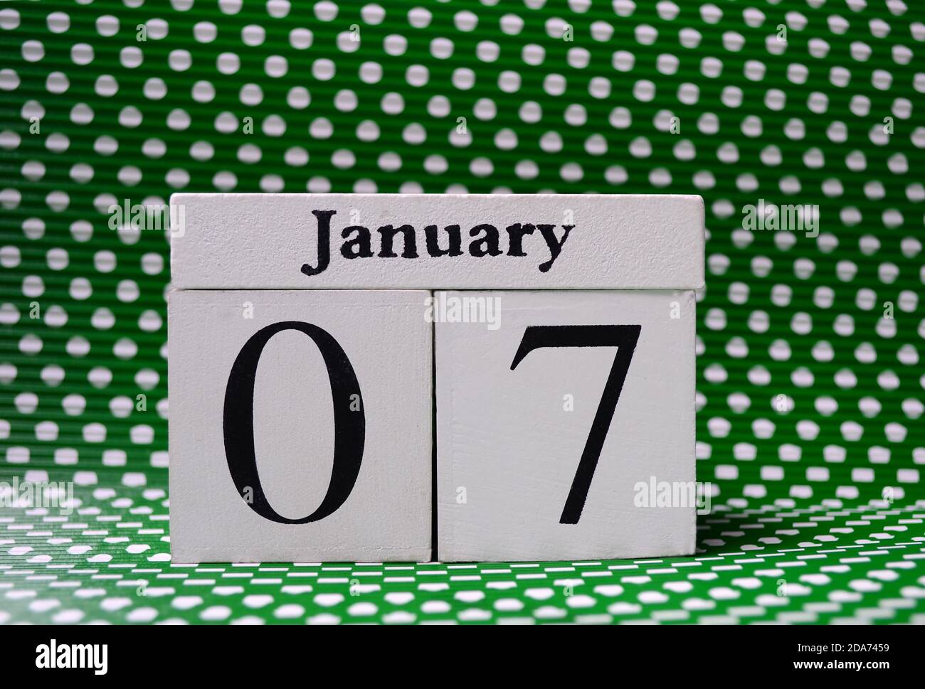 Date 7th January with green polka dots background Stock Photo - Alamy