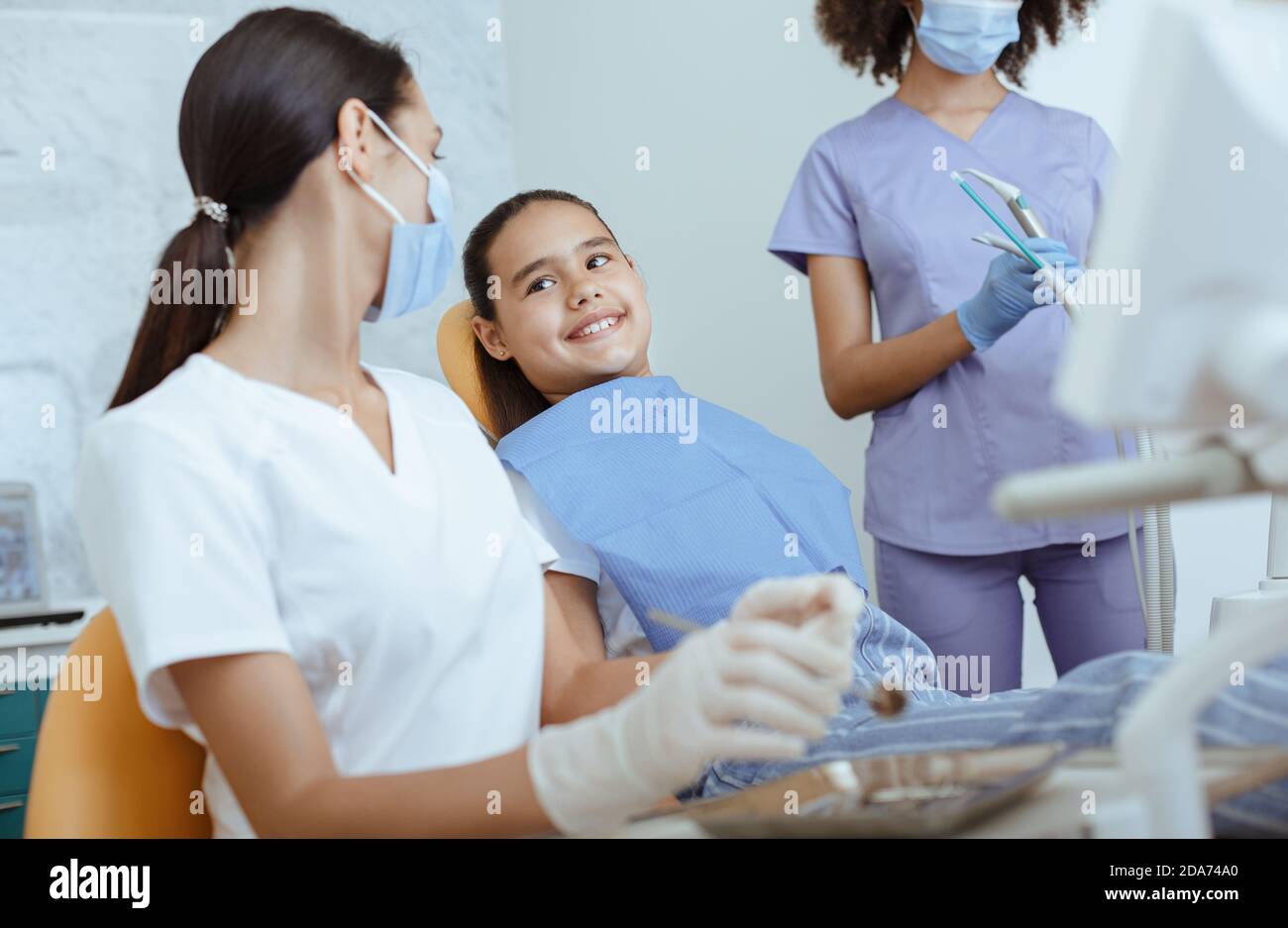 Work of medical dental team with small child Stock Photo - Alamy
