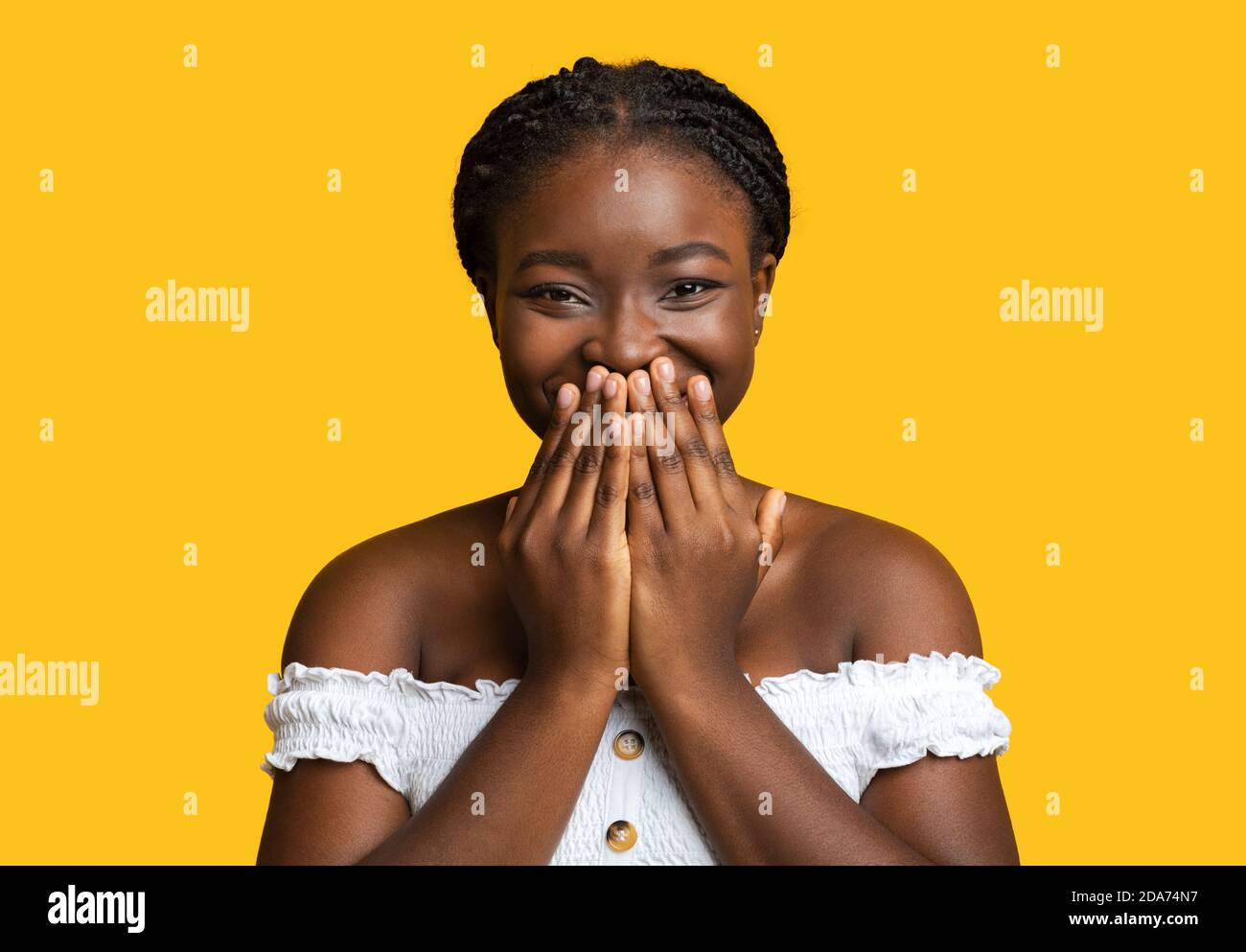 Covering mouth laughing hi-res stock photography and images - Alamy