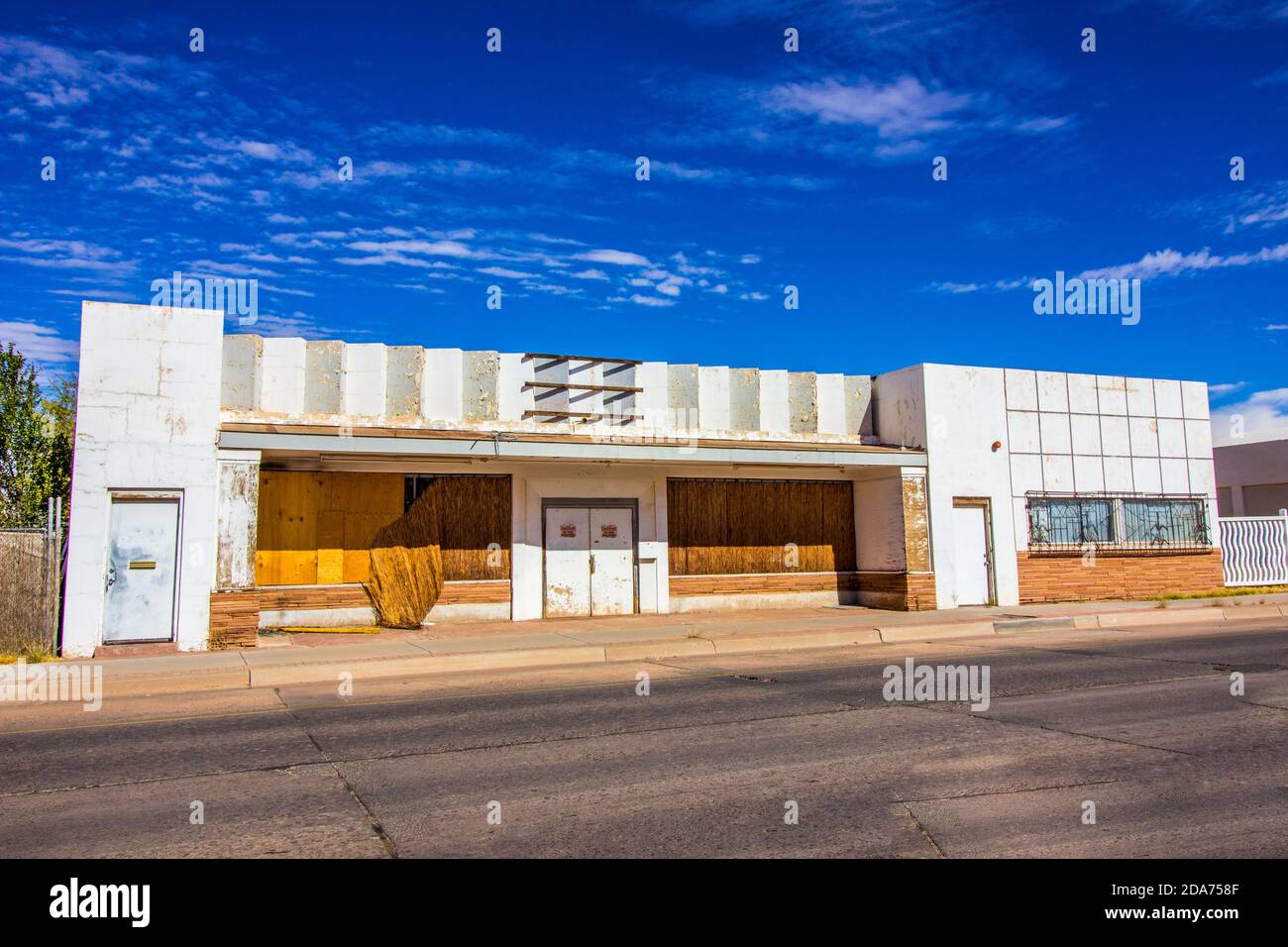 Commercial Store Front Building With Boarded Up Windows Stock Photo - Alamy