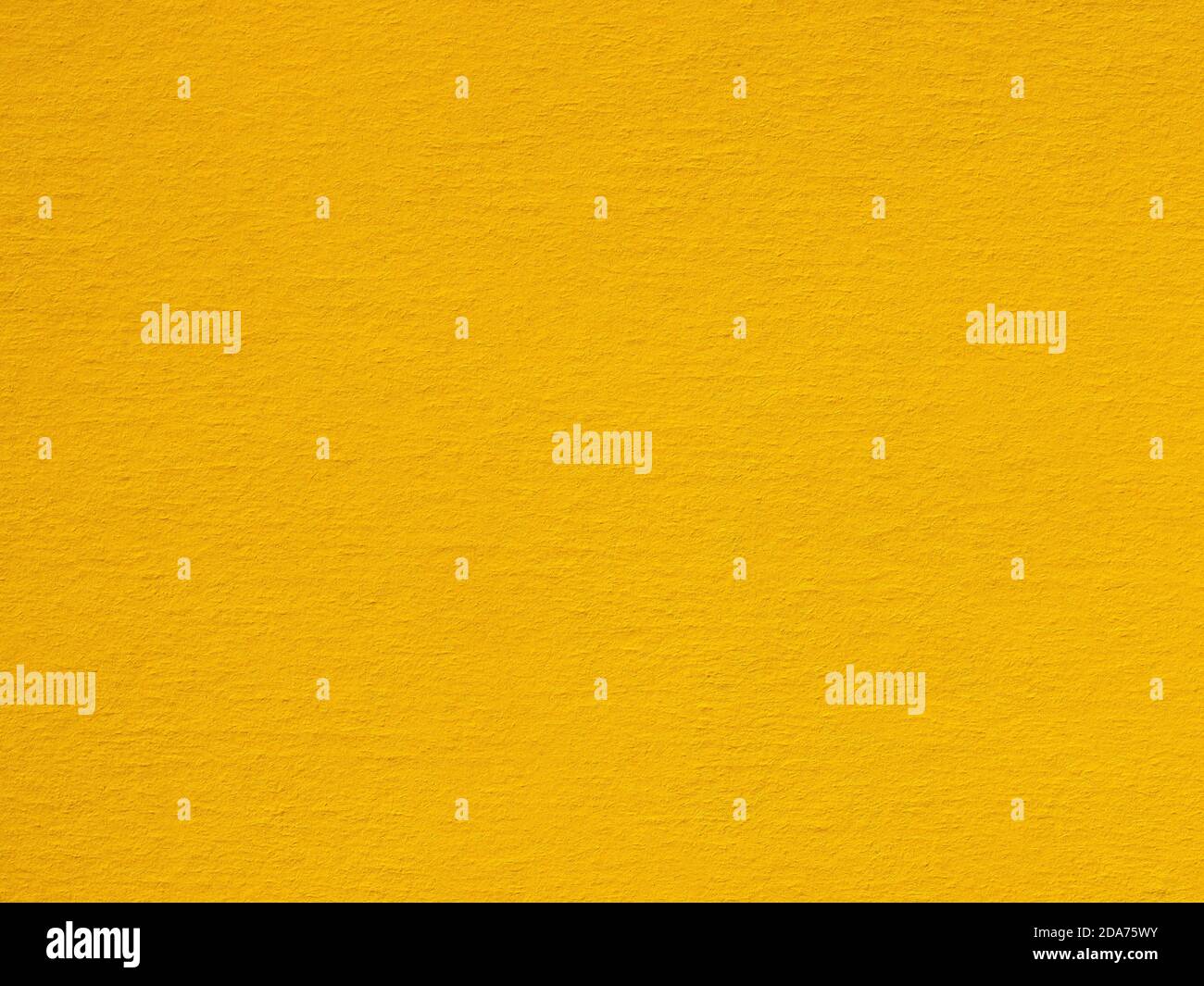Yellow paper texture useful as a background Stock Photo - Alamy