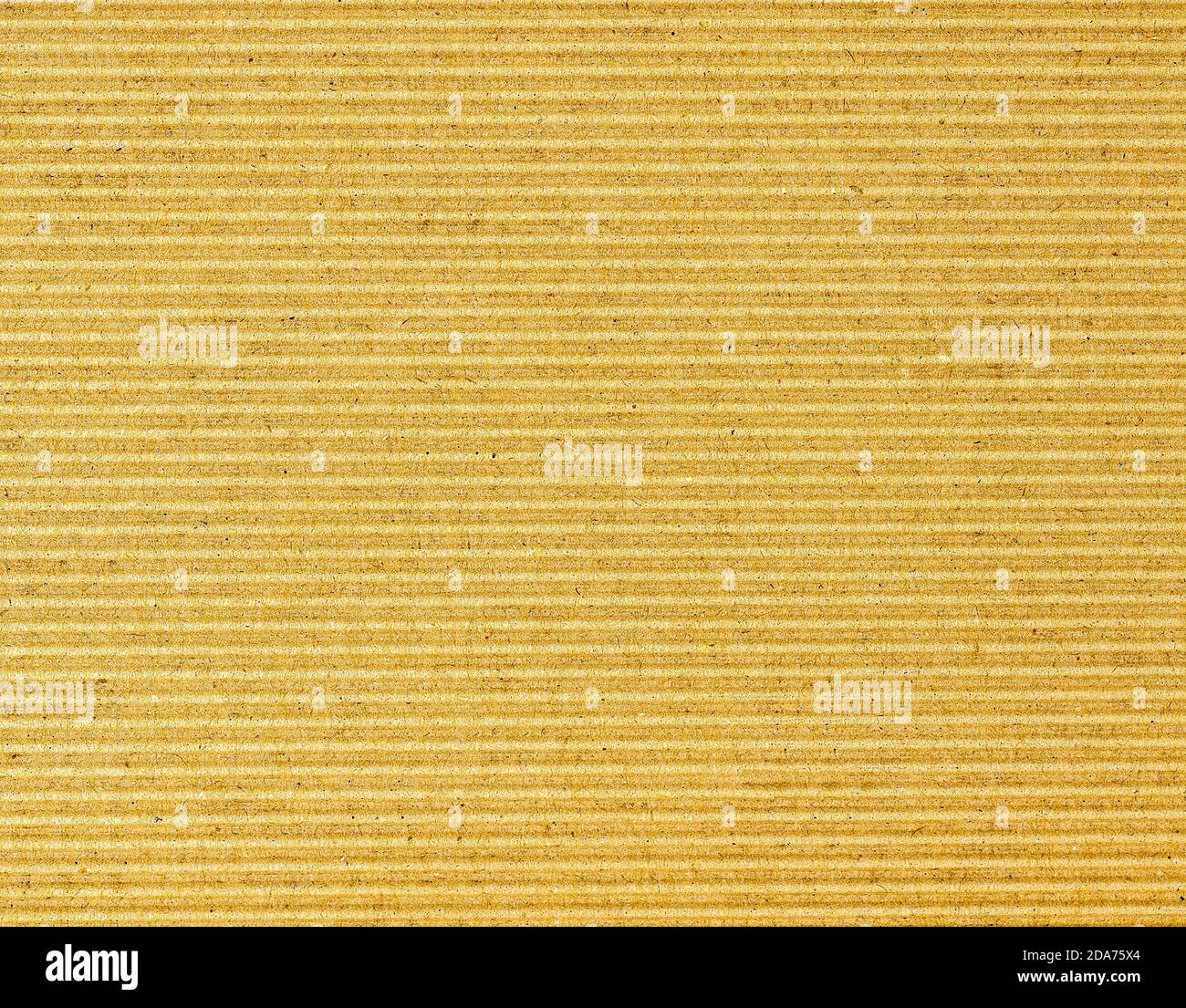 brown corrugated cardboard texture useful as a background, horizontal ...